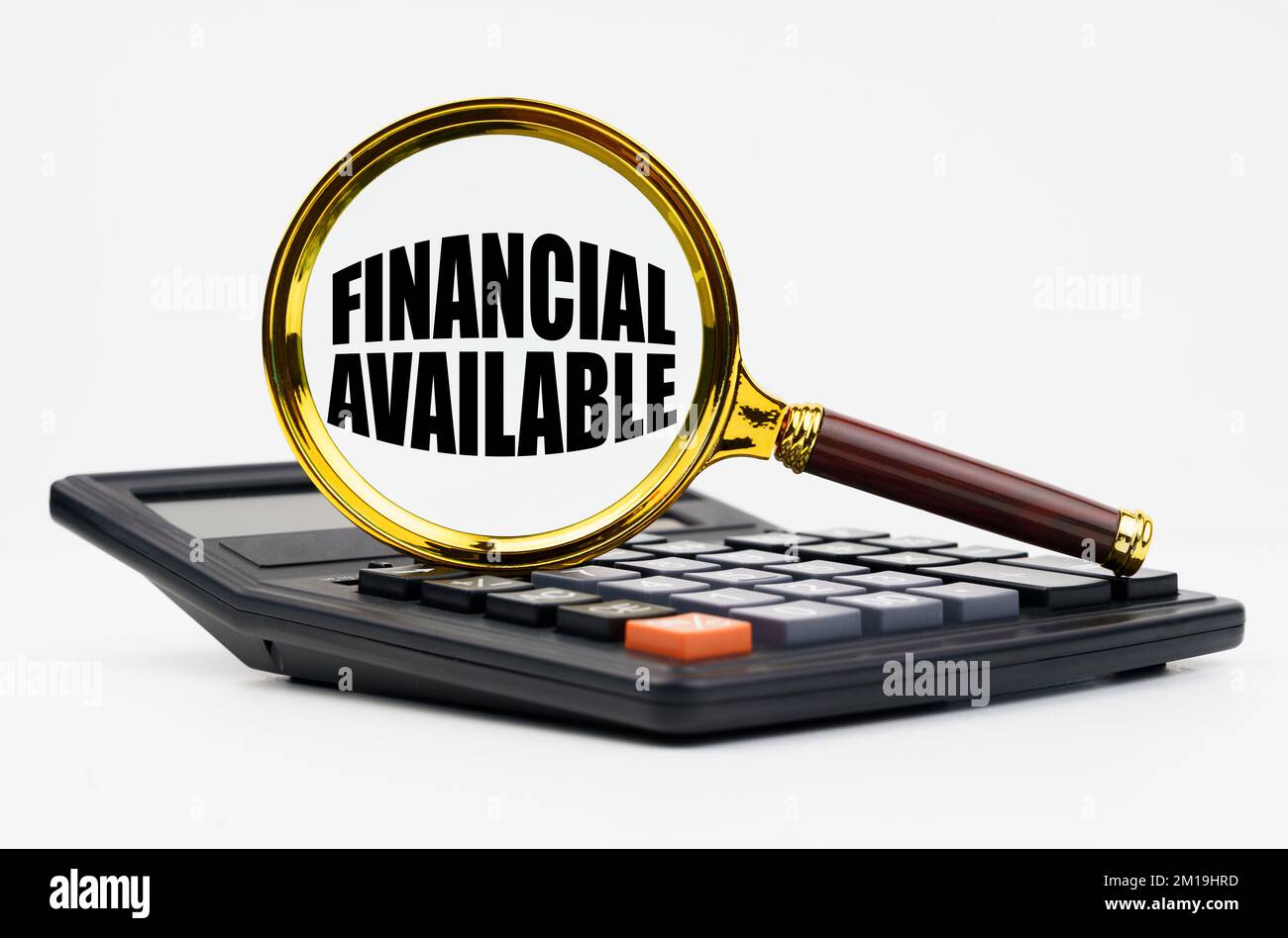 Finance and business concept. On a white background lies a calculator ...