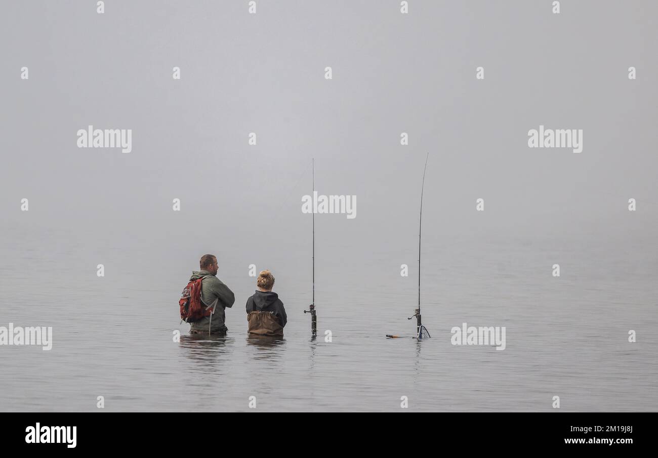 Fishing in the shallow hypersaline Laguna Madre, off South Padre island ...