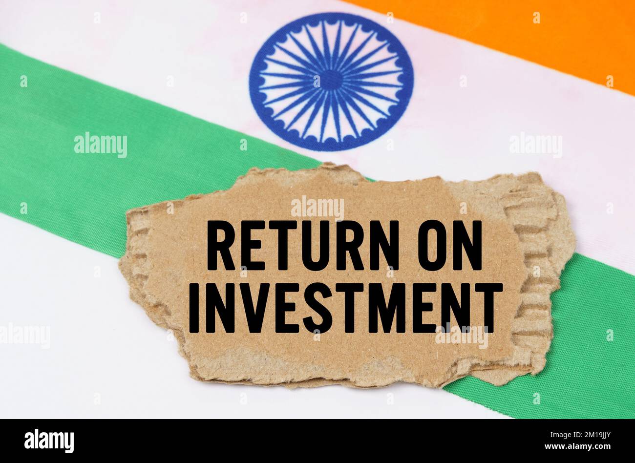 Business and finance concept. The Indian flag has a cardboard box with ...