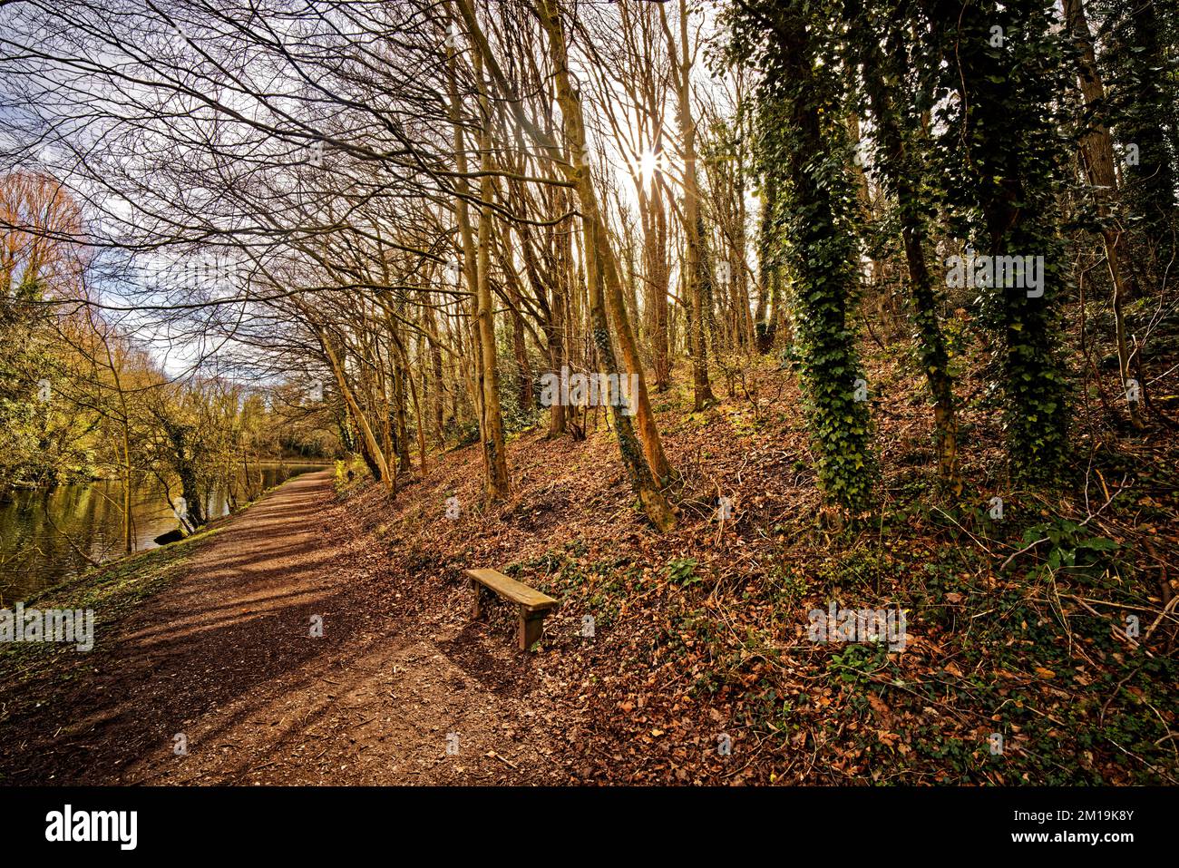 The path along the fishing lake at Moss Valley, Brynteg, Wrexham, North ...