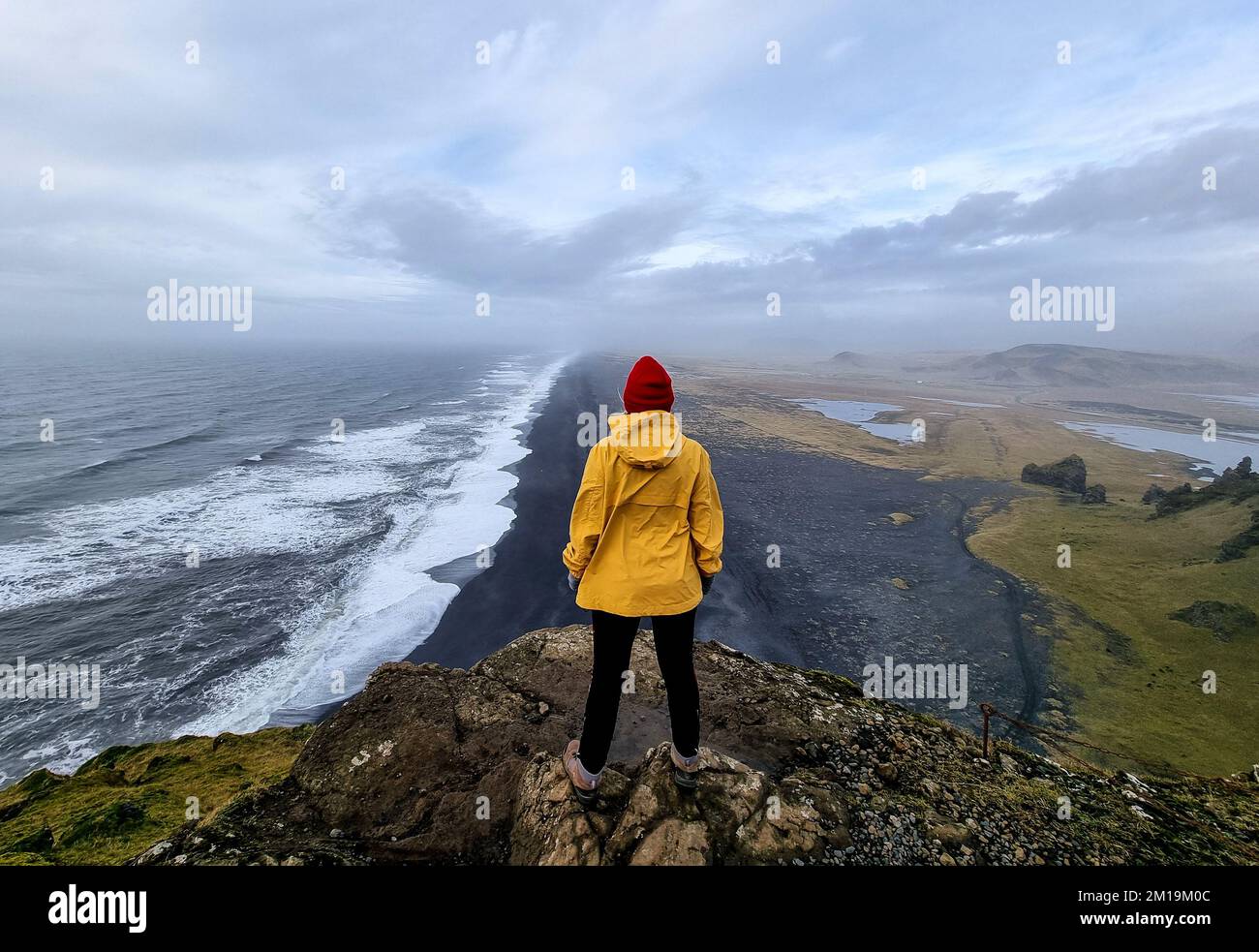 Woman with yellow jacket hi-res stock photography and images - Alamy