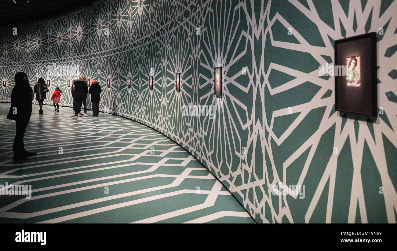 London, UK. 11th Dec, 2022. Visitors look at the works on display. The ...