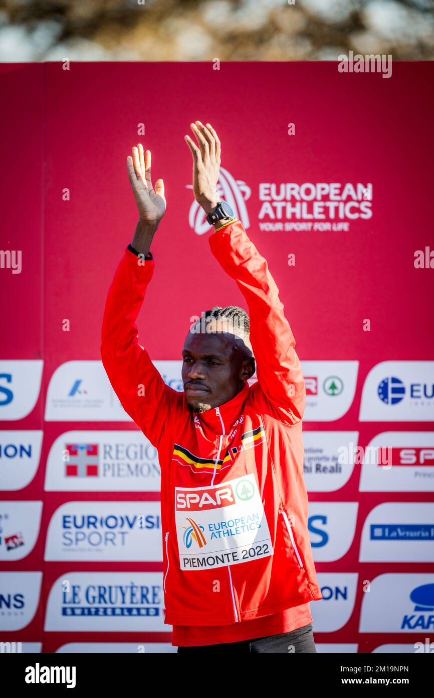Belgian Isaac Kimeli celebrates on the podium after the men's race at ...