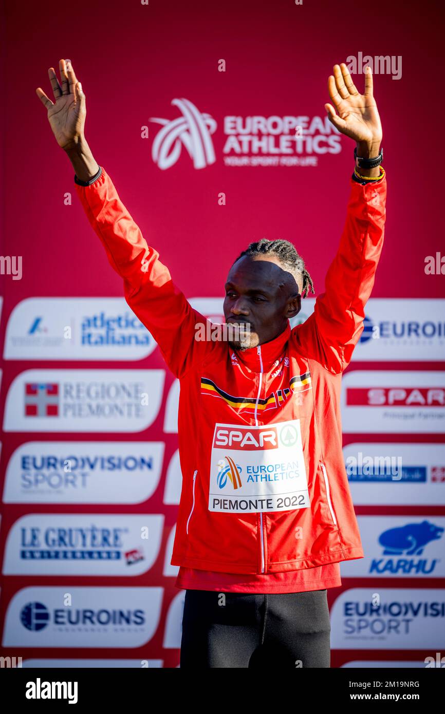 Belgian Isaac Kimeli celebrates on the podium after the men's race at ...