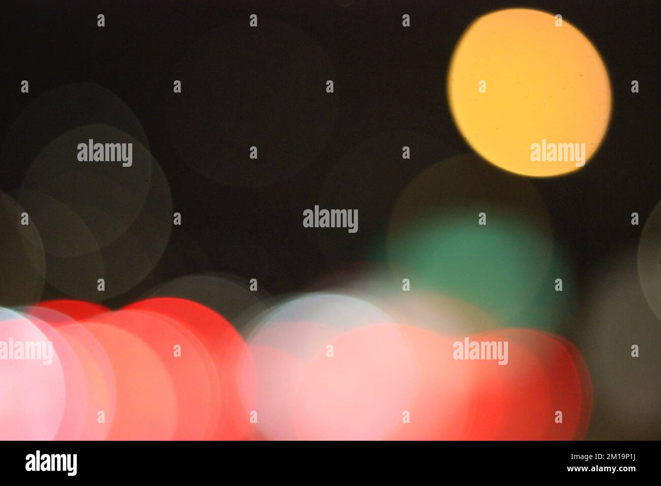 Blurry dreamy view of bright colorful lights Stock Photo - Alamy