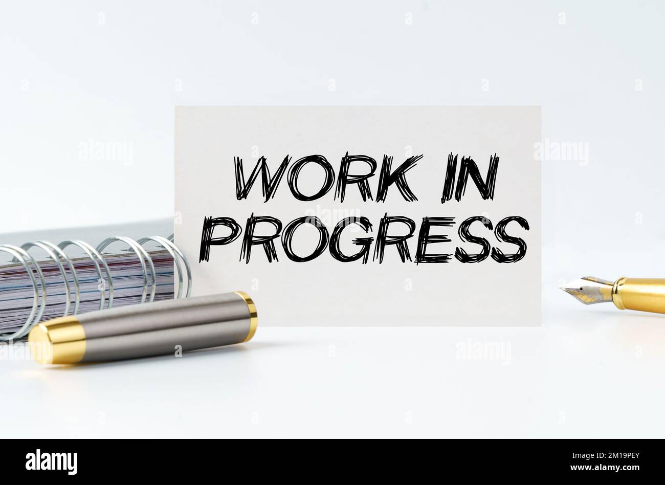 Business and finance concept. On the table is a notebook, a pen and a ...