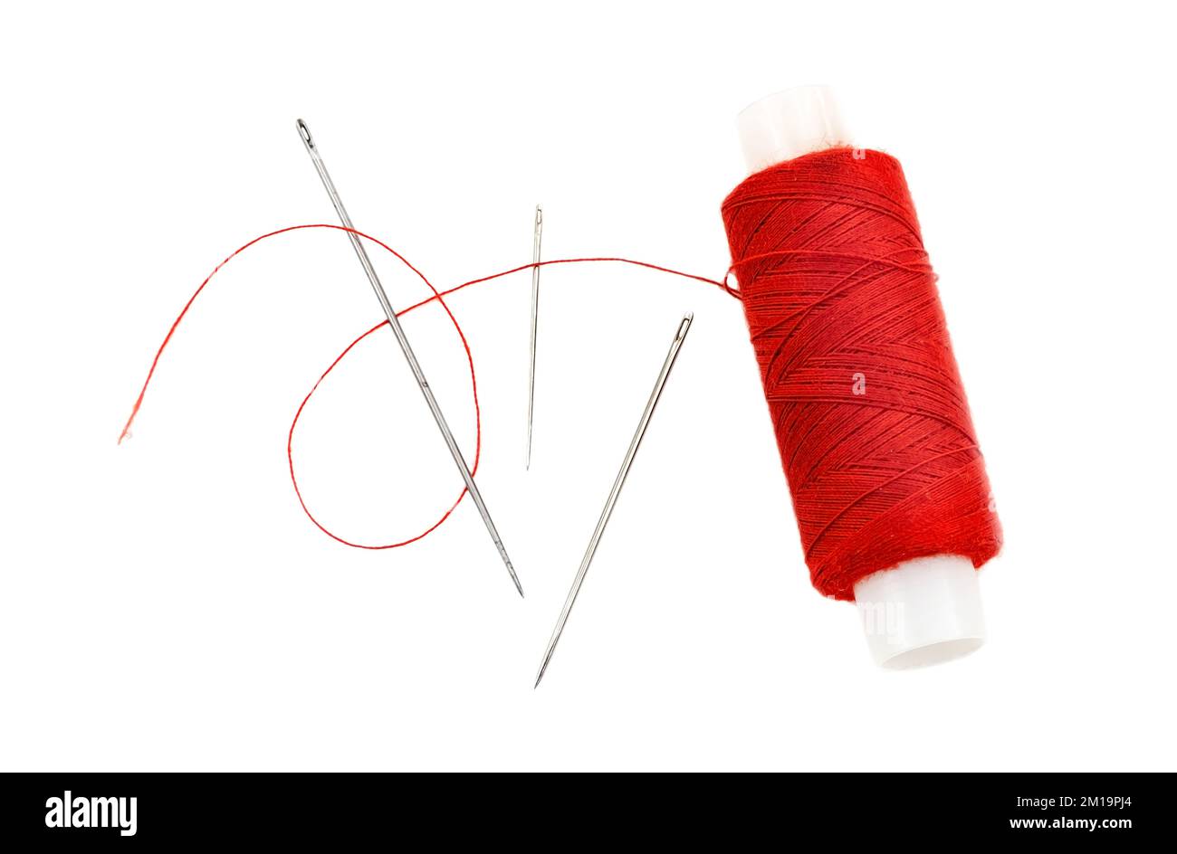 Needle with multi-colored threads on a white background. Eye of a ...