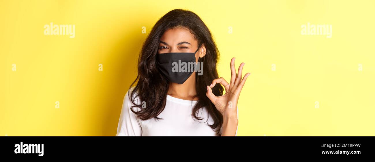 Concept of coronavirus, pandemic and lifestyle. Close-up of cheeky ...