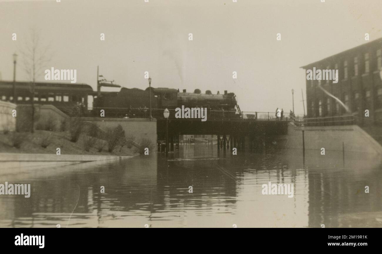 Train on railroad bridge crossing Parker Street , Floods, Railroad ...