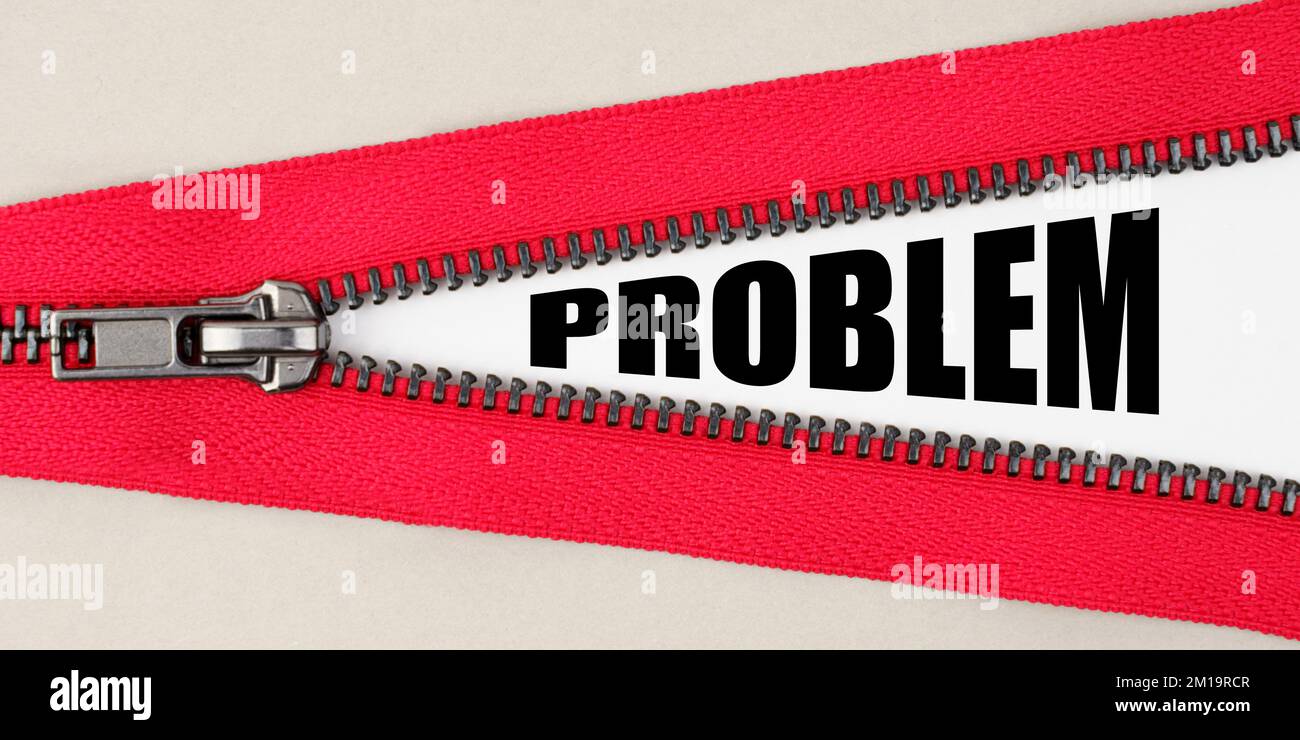 Finance and business concept. On a gray background, a red zipper ...