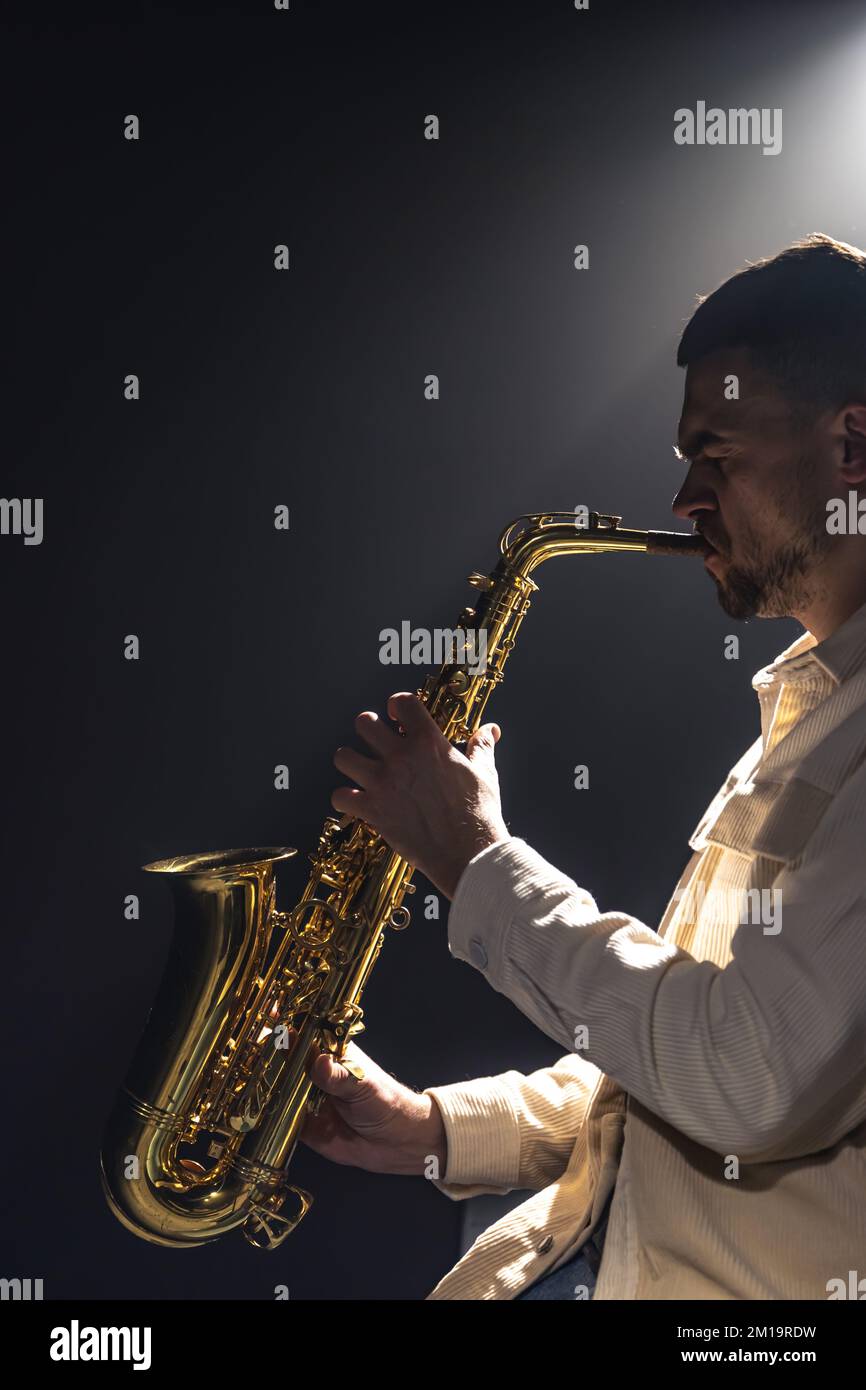 Sax player in the sun hi-res stock photography and images - Alamy