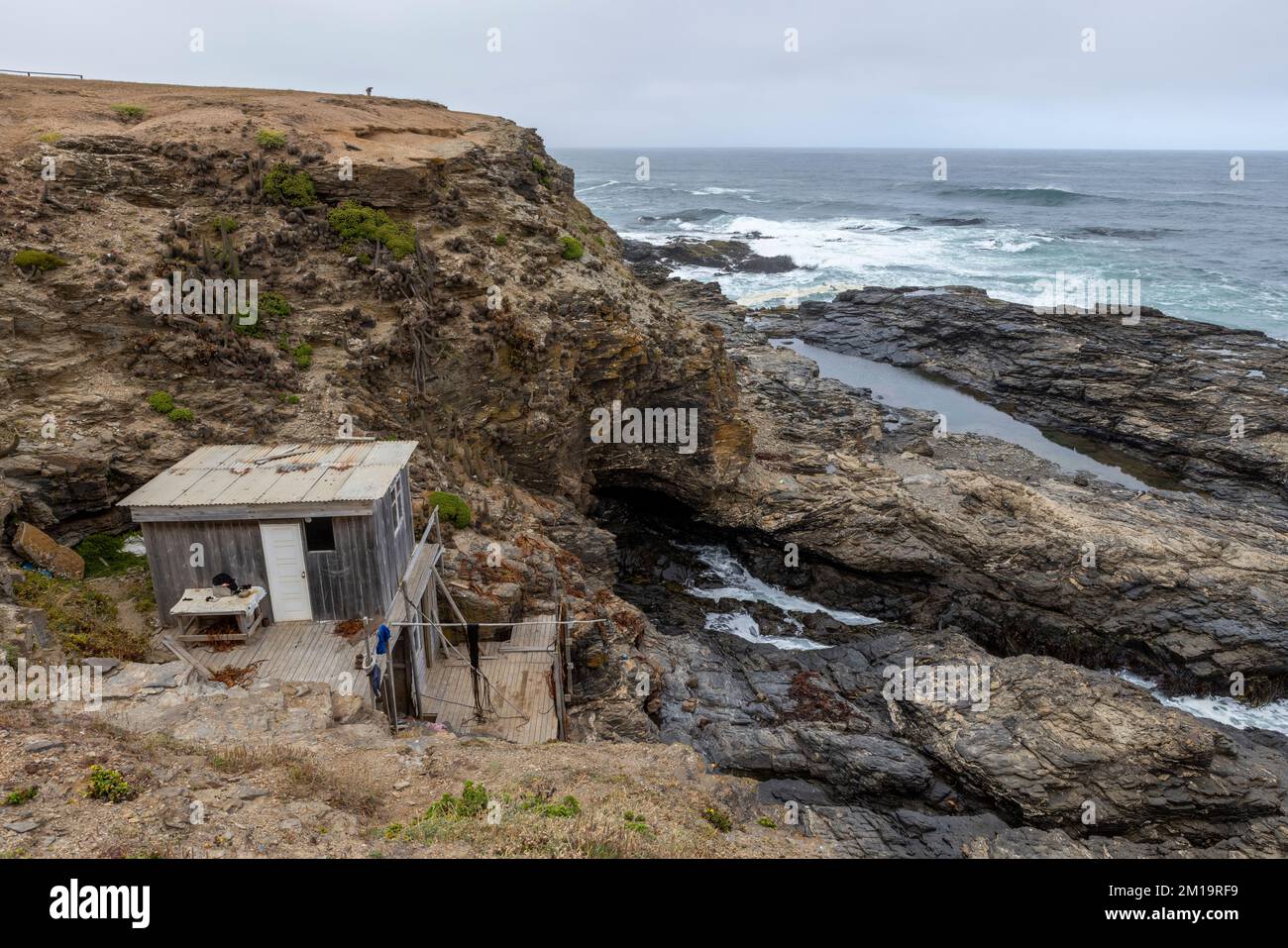 Shack at the rough coast of Pichilemu, Chile Stock Photo - Alamy