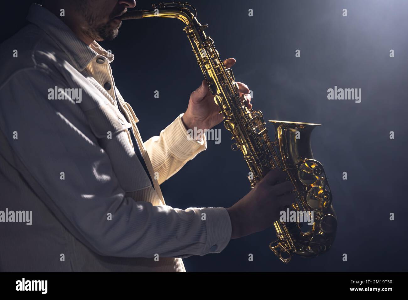 Sax player in the sun hi-res stock photography and images - Alamy