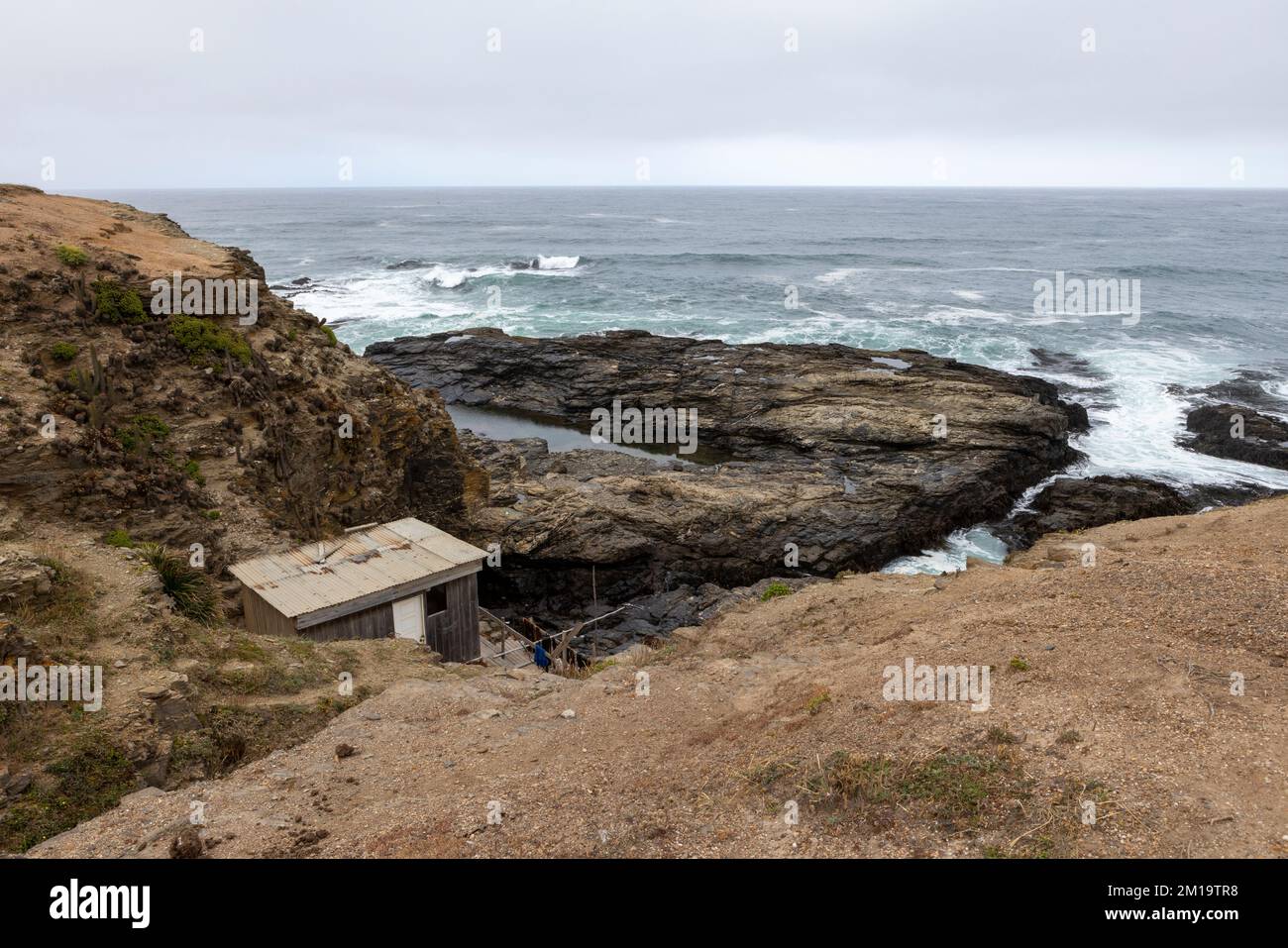 Shack at the rough coast of Pichilemu, Chile Stock Photo - Alamy