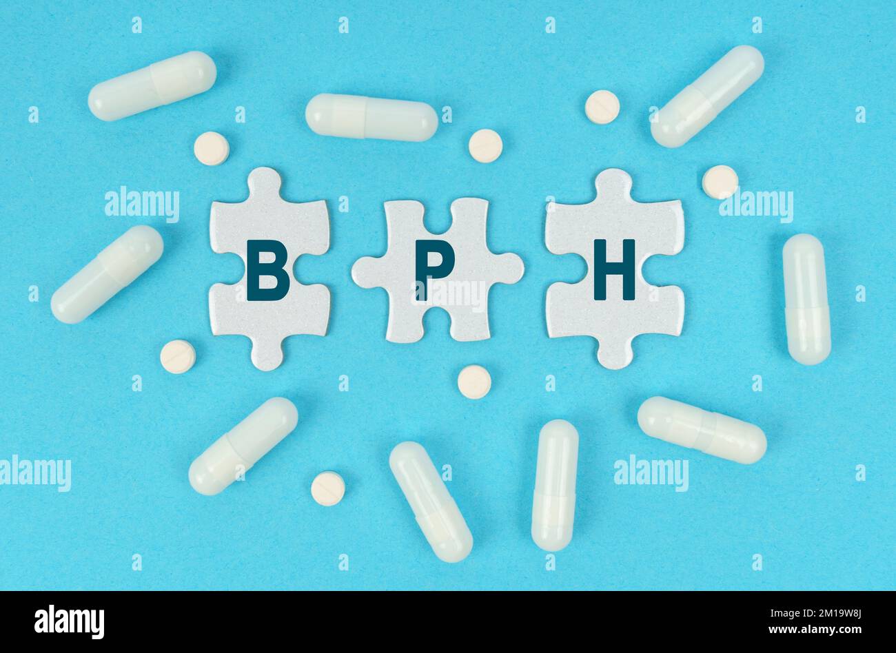 Medicine and health. On a blue background, there are pills and puzzles ...