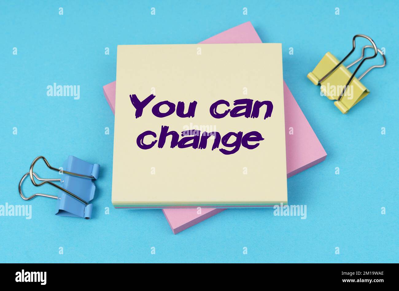 Business and finance concept. On the table are paper clips, note paper ...