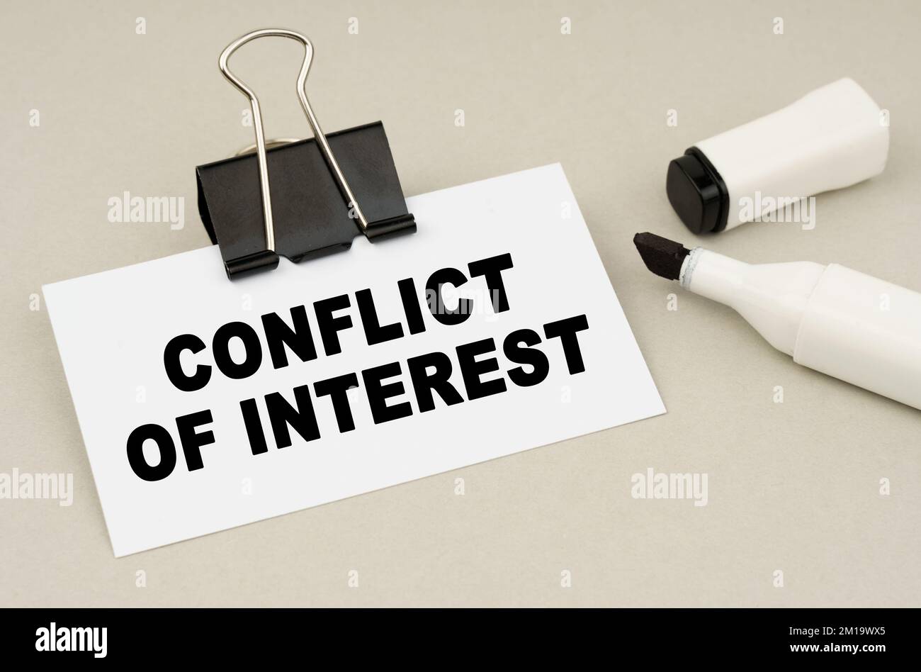 Finance and business concept. On a gray background lies a marker and a ...