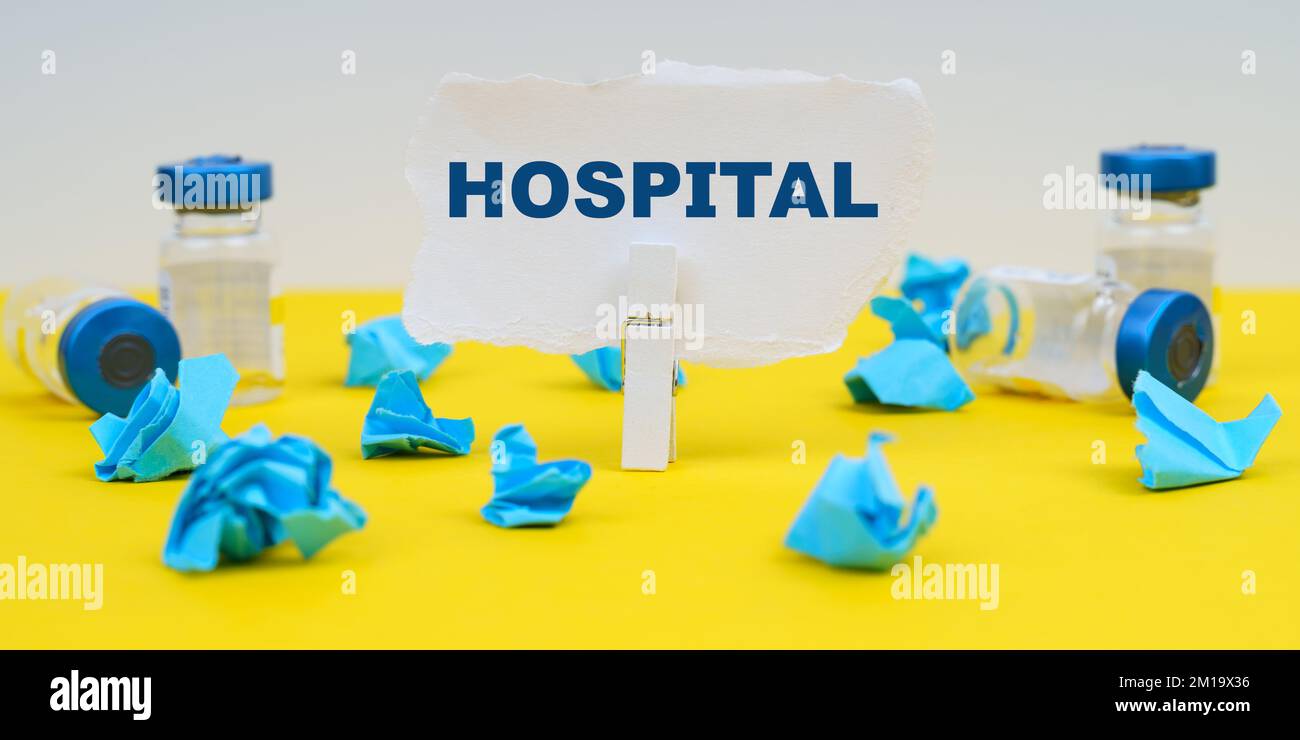 Medicine and health concept. On a yellow background are ampoules, blue ...