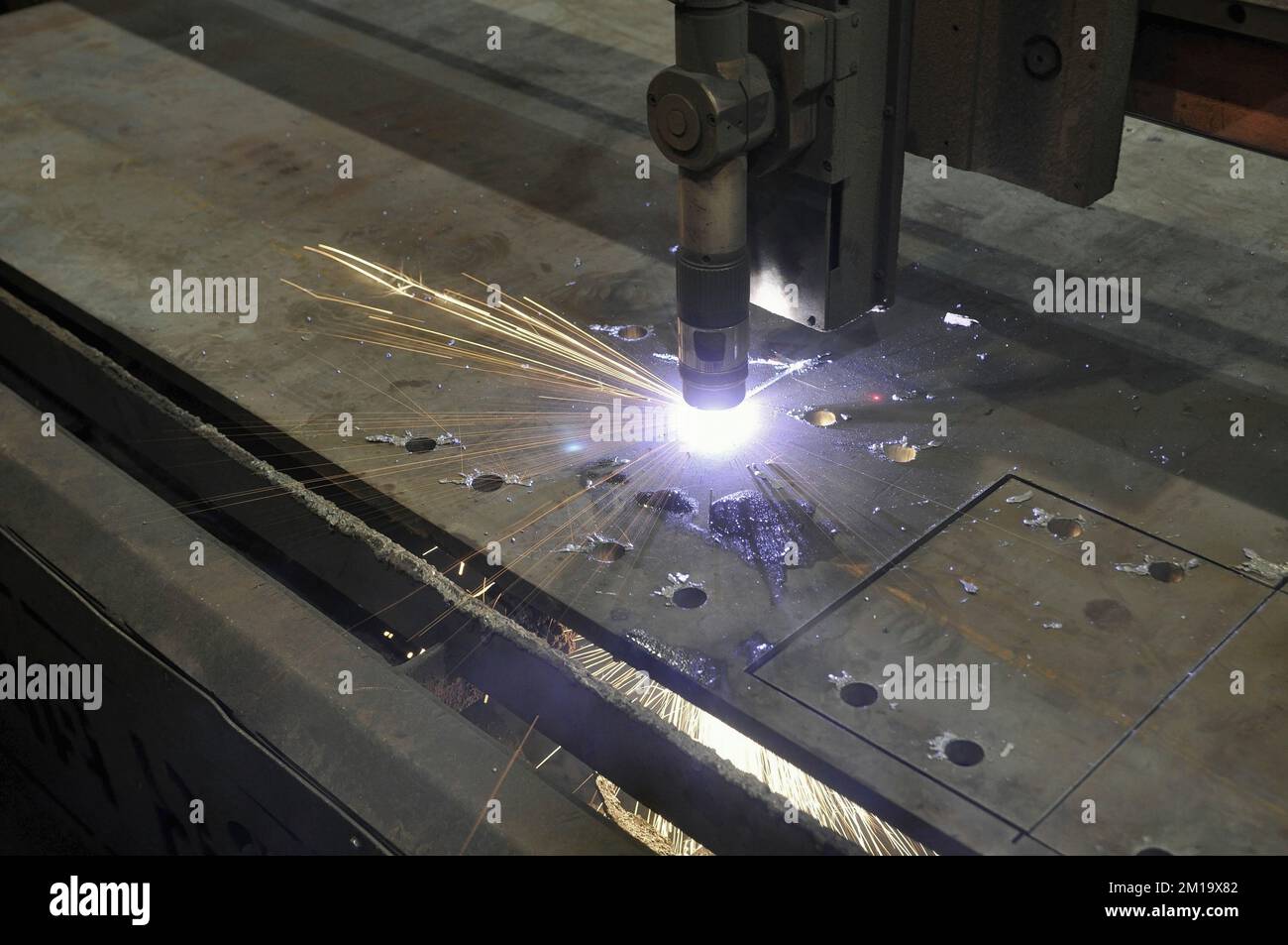 Metal cutting processing. The process of cutting sheet metal on a CNC ...
