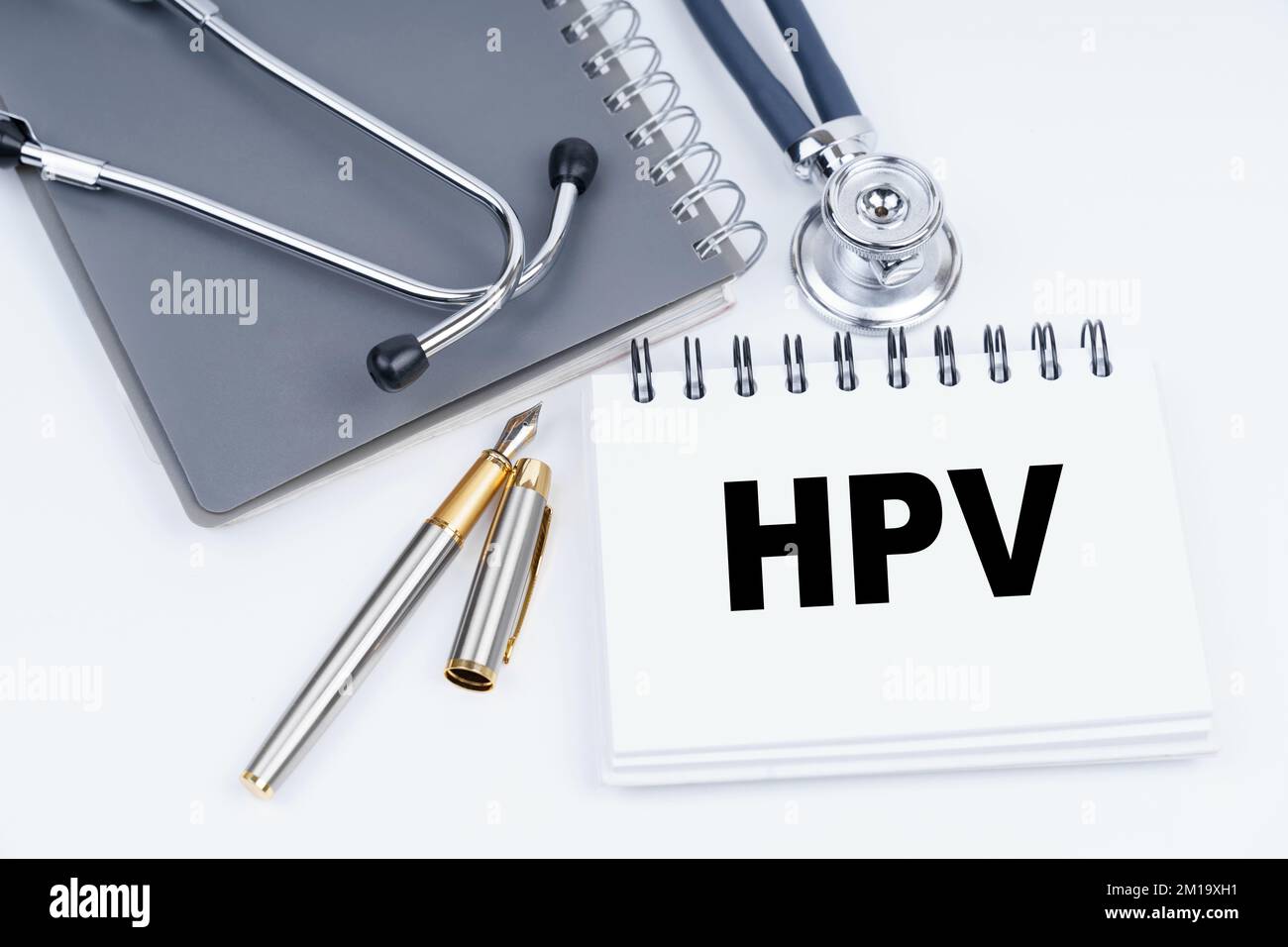 Medicine and health concept. On the table are a stethoscope, a pen and ...