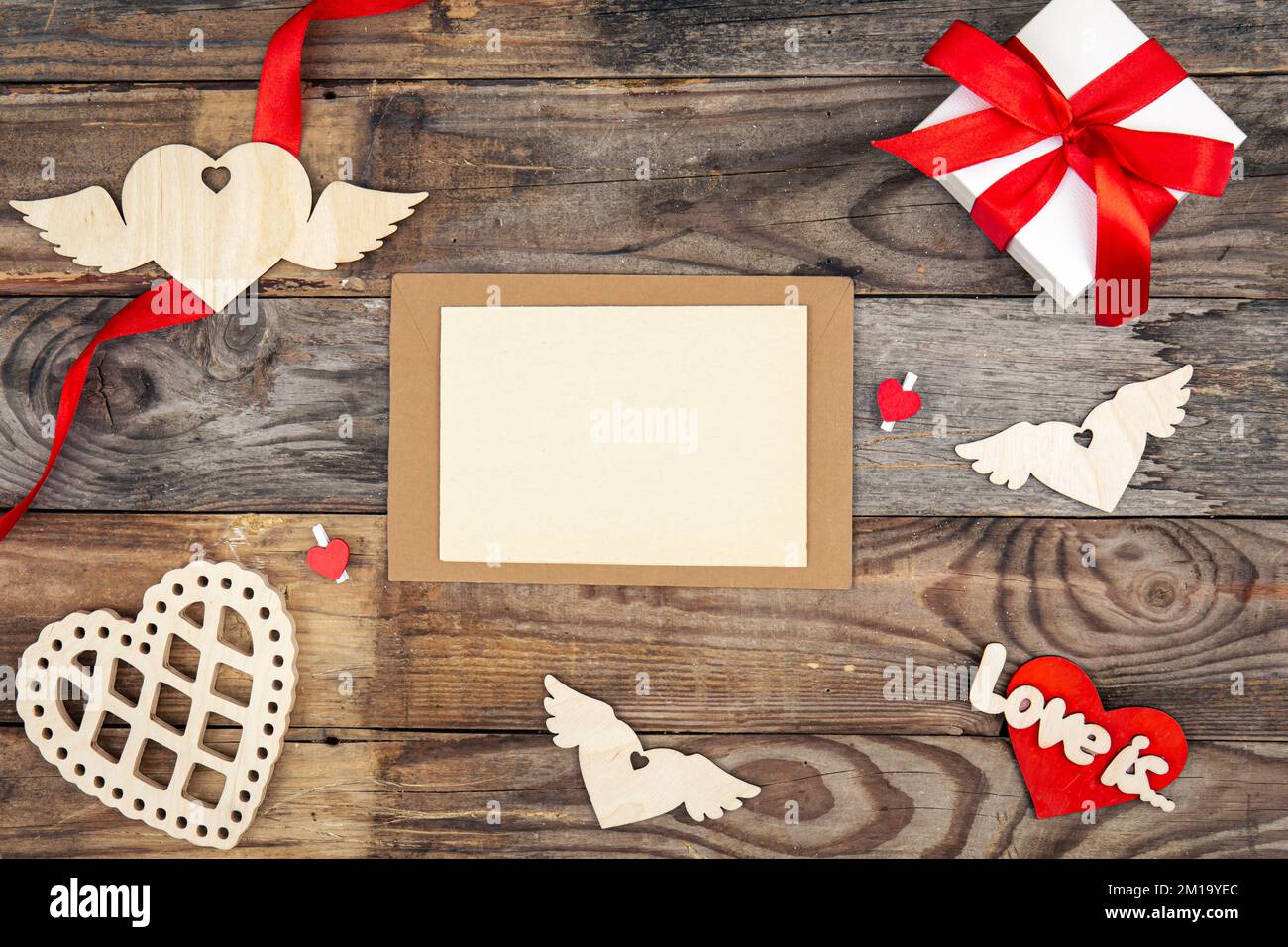 Envelope and blank paper on wooden background, Valentine's day concept ...