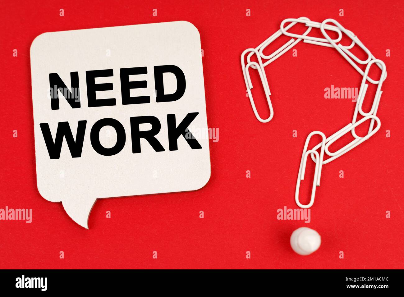 Economy and business concept. On a red background are a question mark ...
