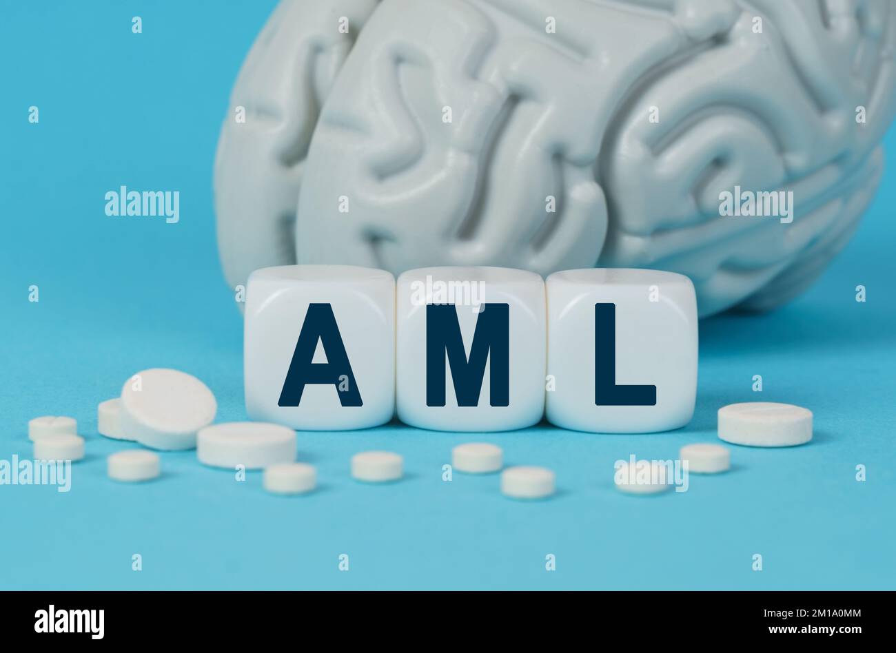 Medicine and health. Cubes lie on the table among the pills and ...