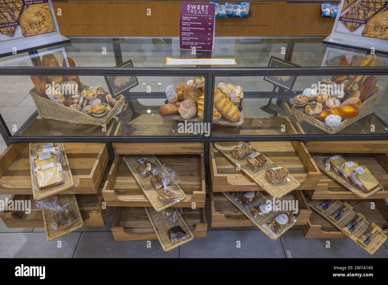 Close up view of shelves with sweet bakery products in Macy's store ...