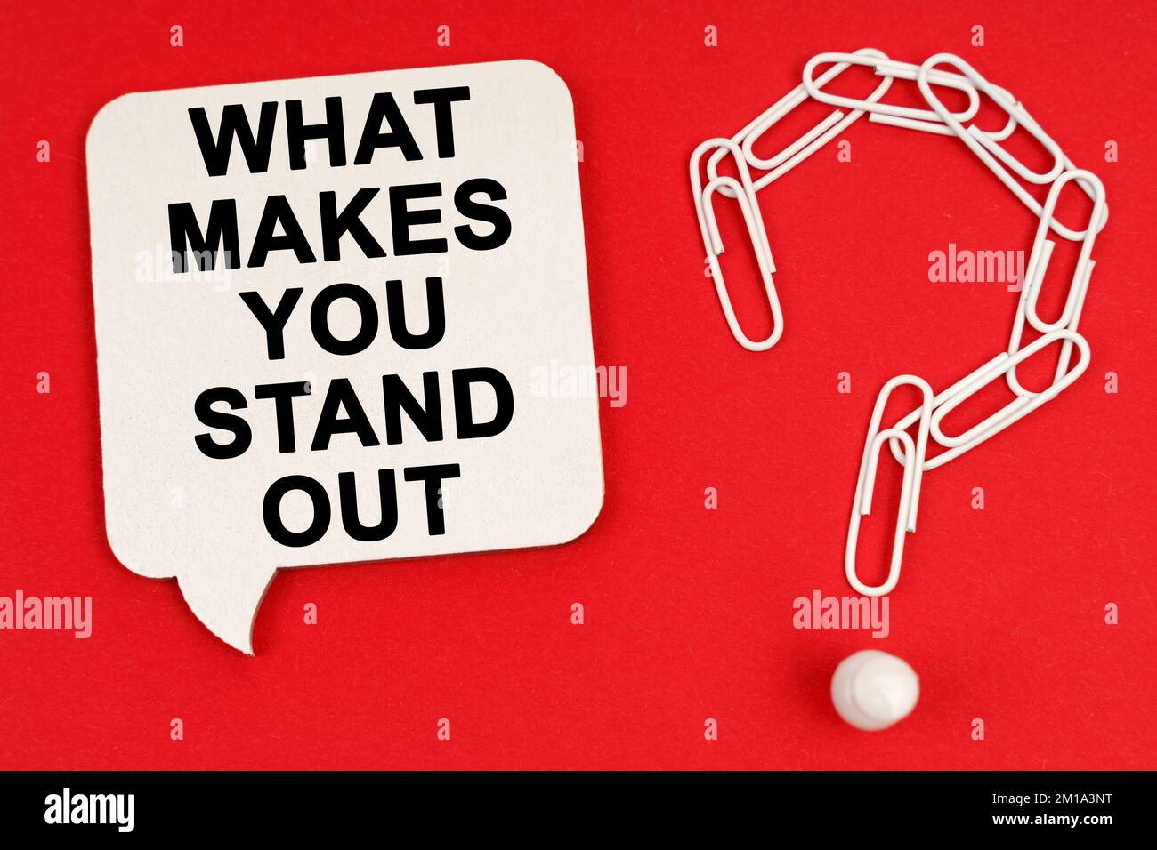 Economy and business concept. On a red background are a question mark ...