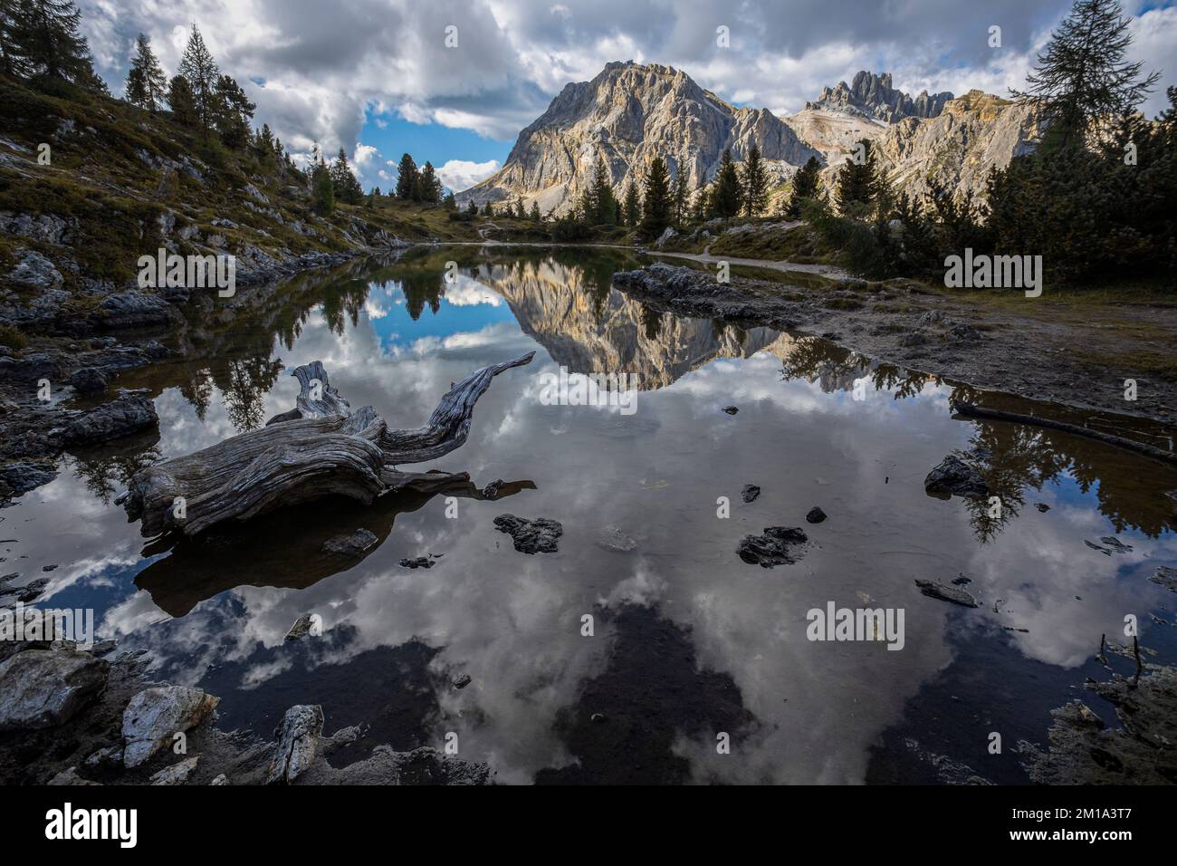 Reflections on Lake Limedes in the Dolomites near Falzarego pass, Italy ...