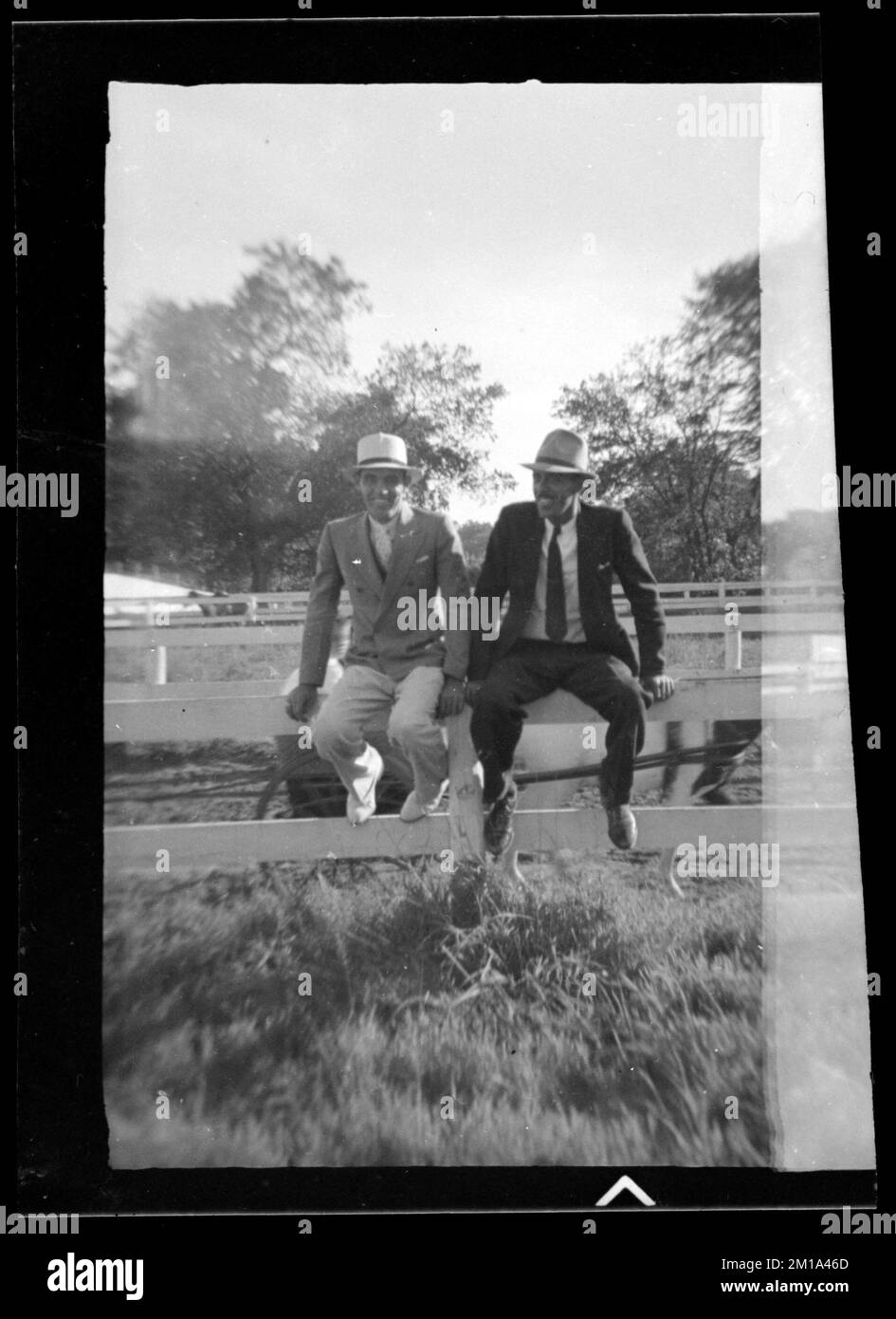 Two men on a wooden fence , Fences. Jack Miller Collection Stock Photo ...