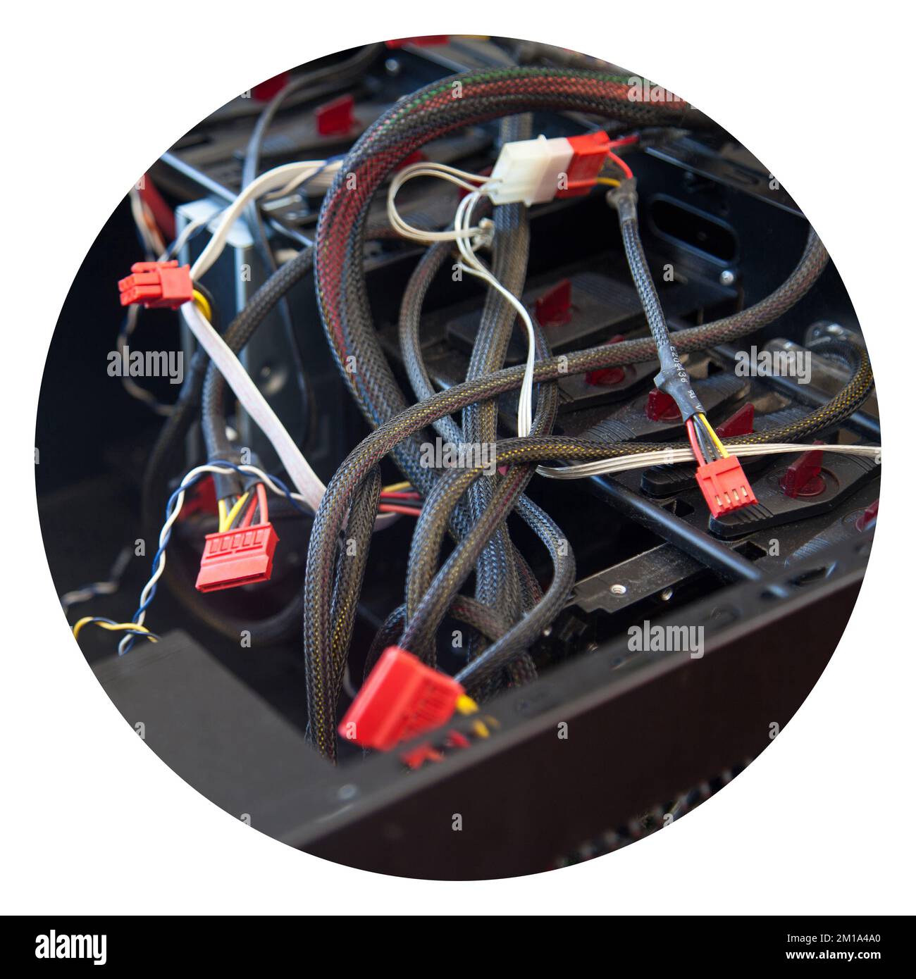 Desktop computer, black empty case and various cables, which are tried ...