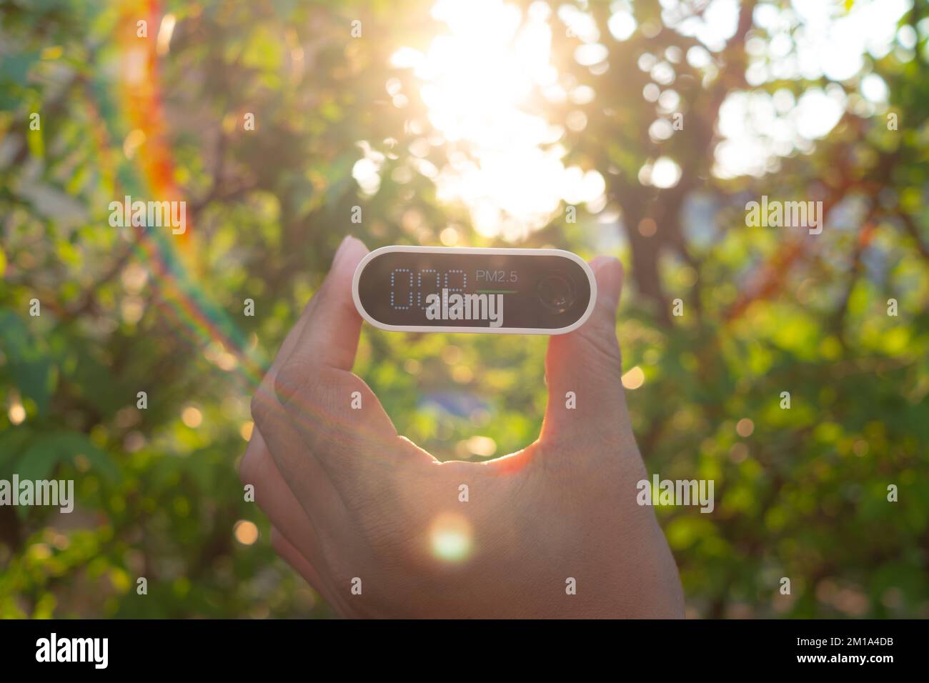 Close up portable air quality monitor detect PM 2.5, the low level is ...