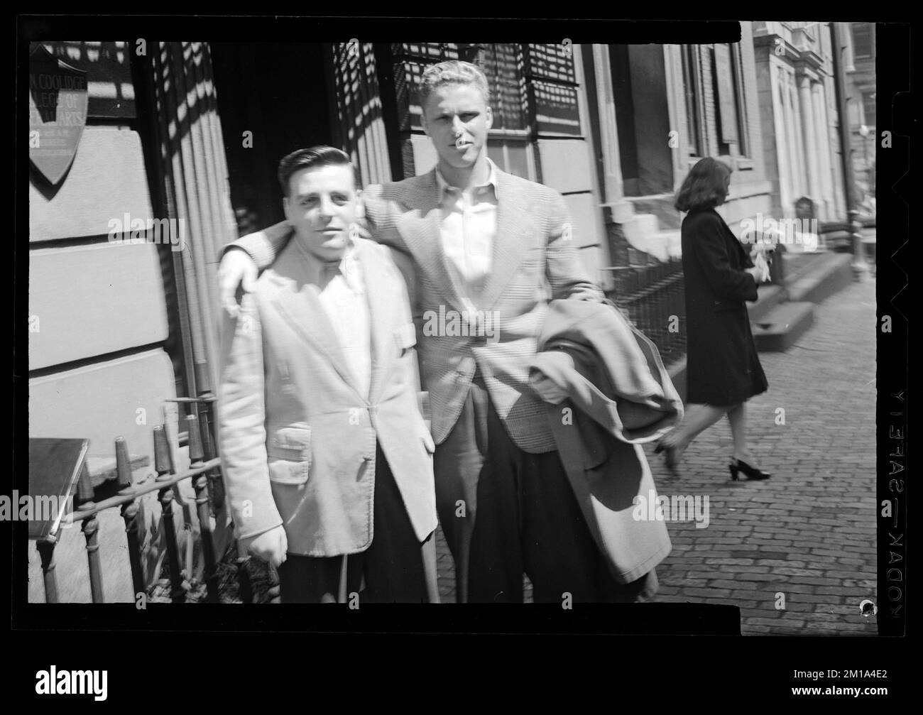 Two men stand Black and White Stock Photos & Images - Alamy