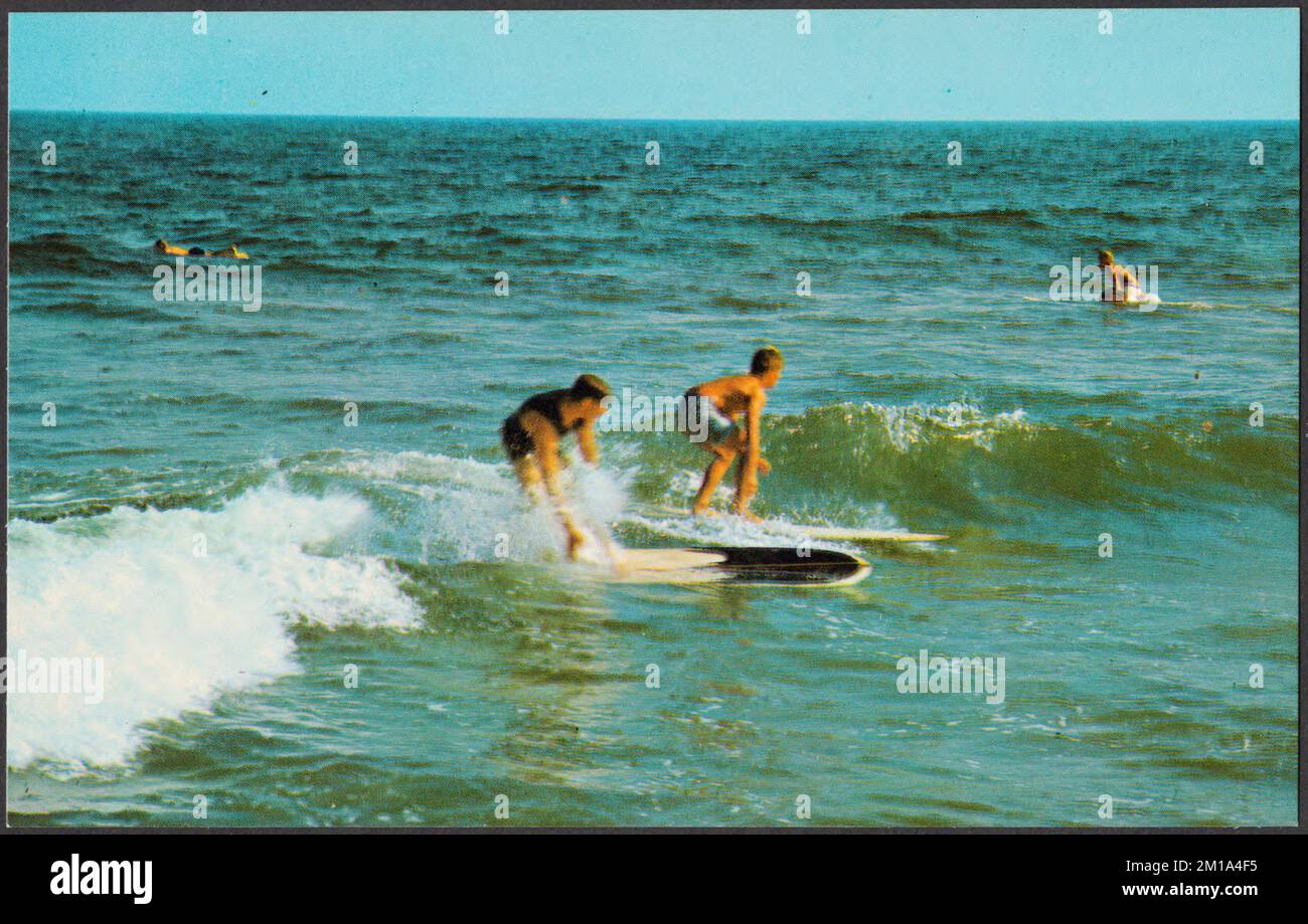 Two men surfing, swimmers in background , Surfing, Seas, Tichnor ...