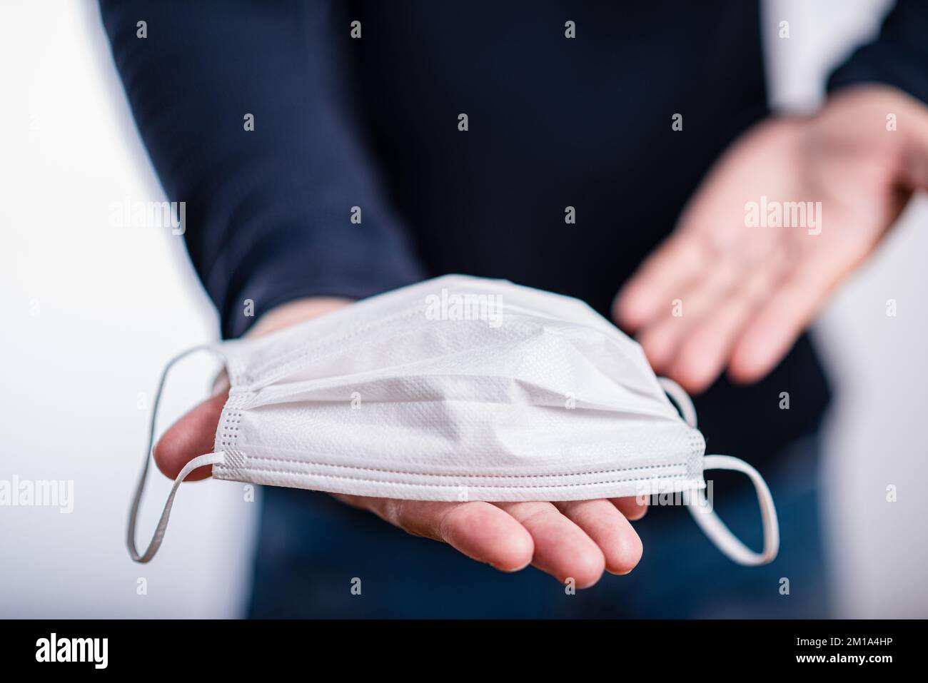 The man giving you a face mask to protect yourself from Coronavirus ...