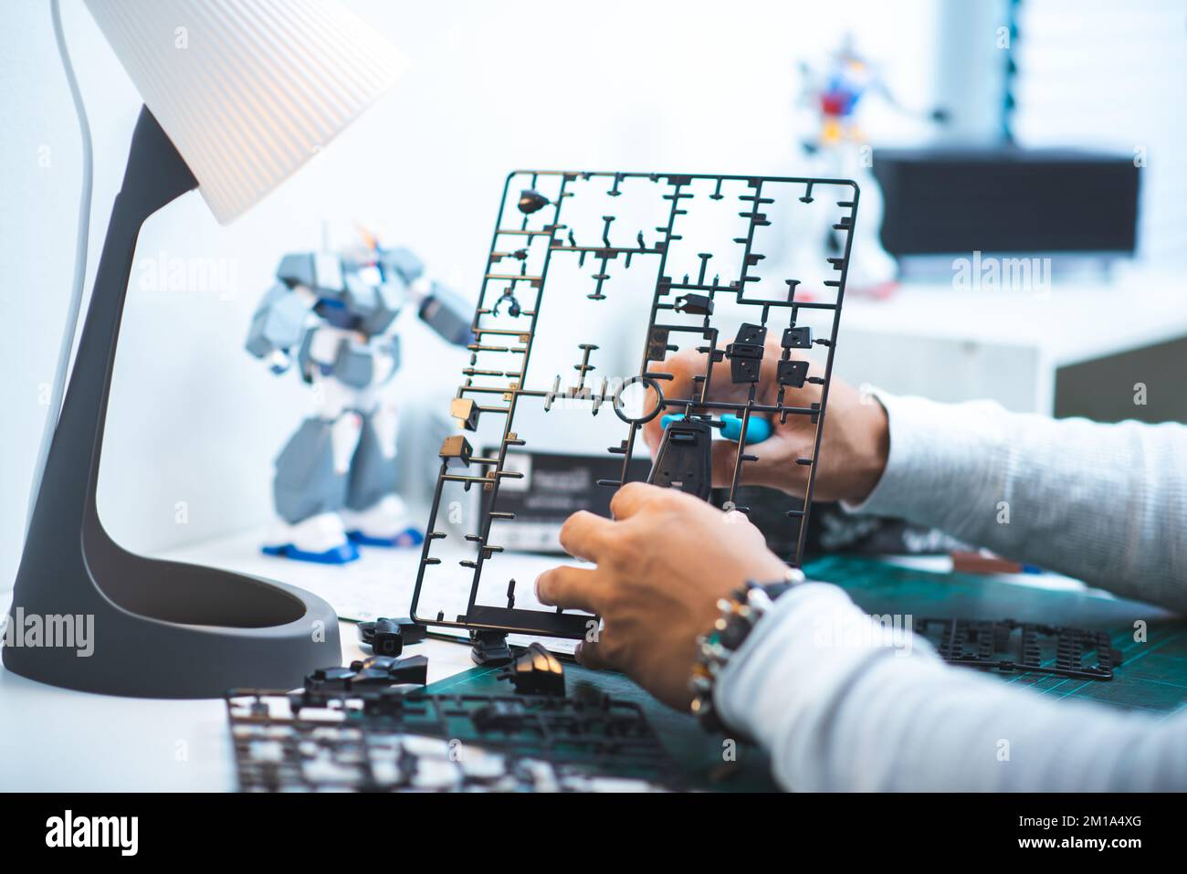 The man assembling robot model kits. Leisure and hobby concept Stock ...