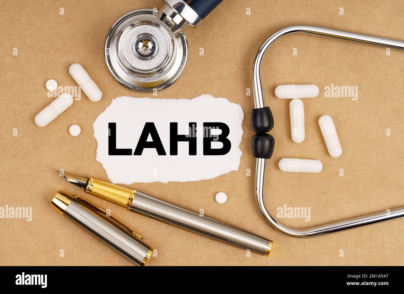 Medicine and health concept. On the table is a stethoscope, pills, a ...