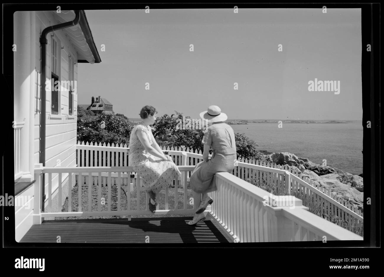 Two women looking out over beach scene , Fences, Waterfronts. Samuel ...