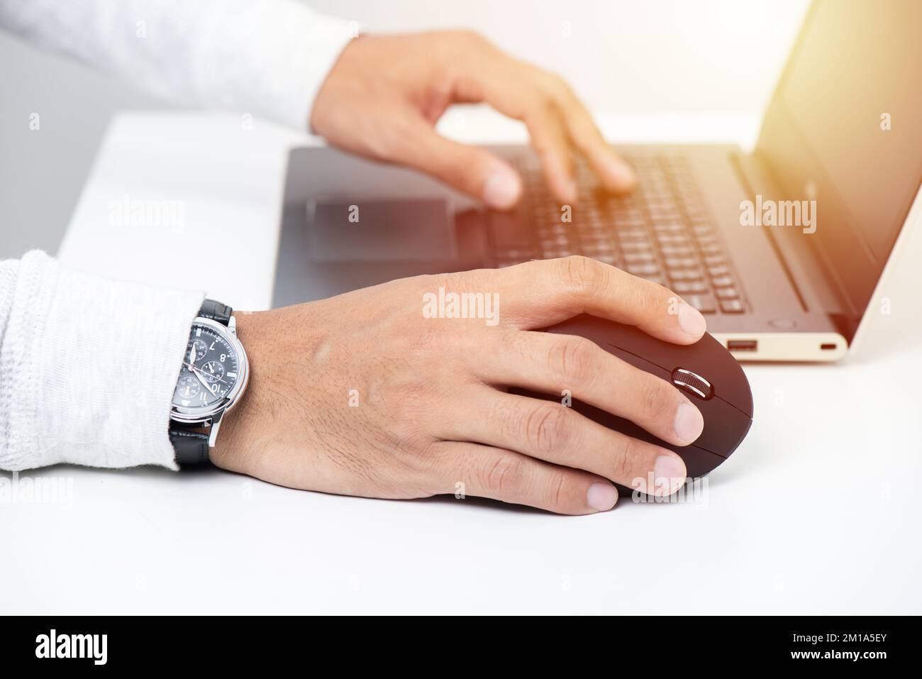 Black vertical optical computer mouse with ergonomic design. This mouse ...