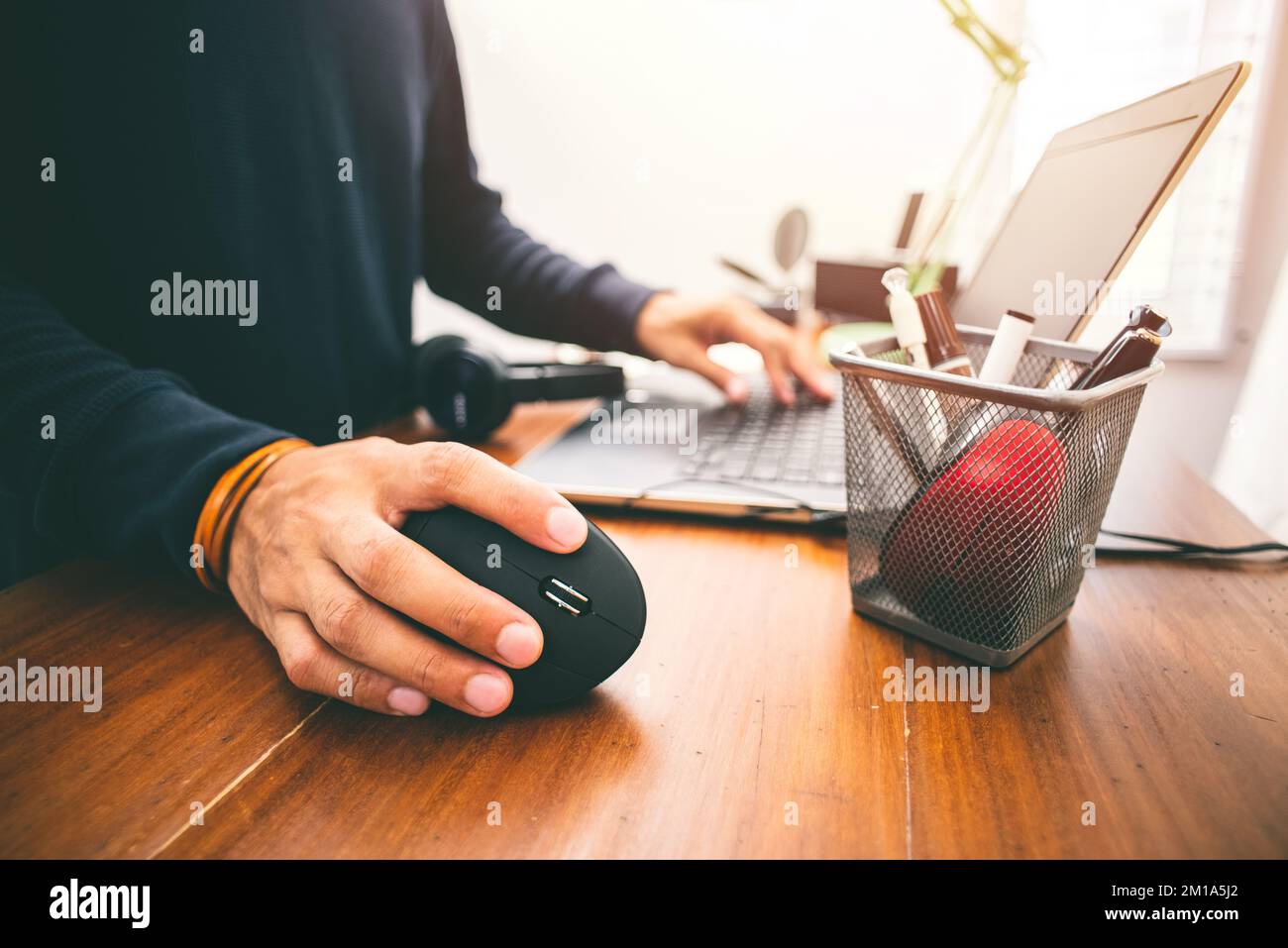 The man using black vertical optical computer mouse with ergonomic ...