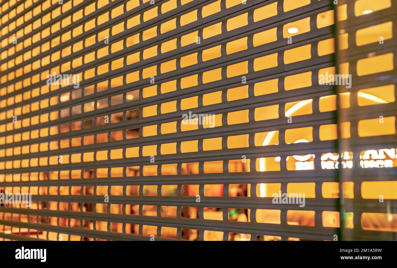 Wired meshed shutter background, texture of closed shop. Aluminum metal ...