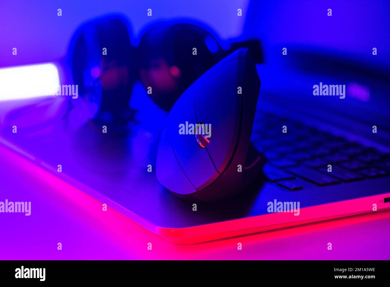 Black vertical optical computer mouse with ergonomic design. This mouse ...