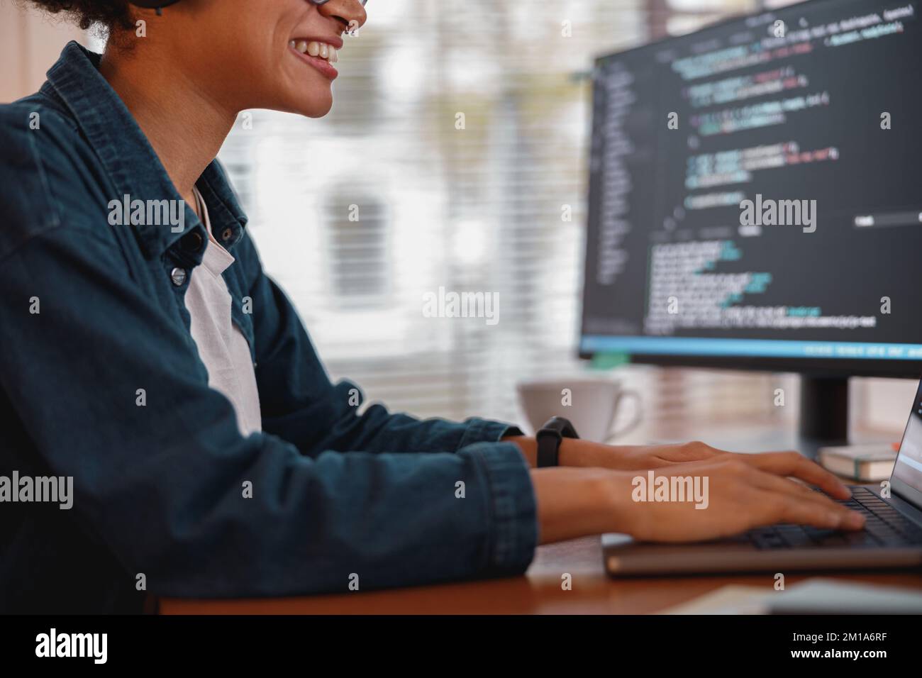 Female freelancer making new project as web designer and programmer on ...