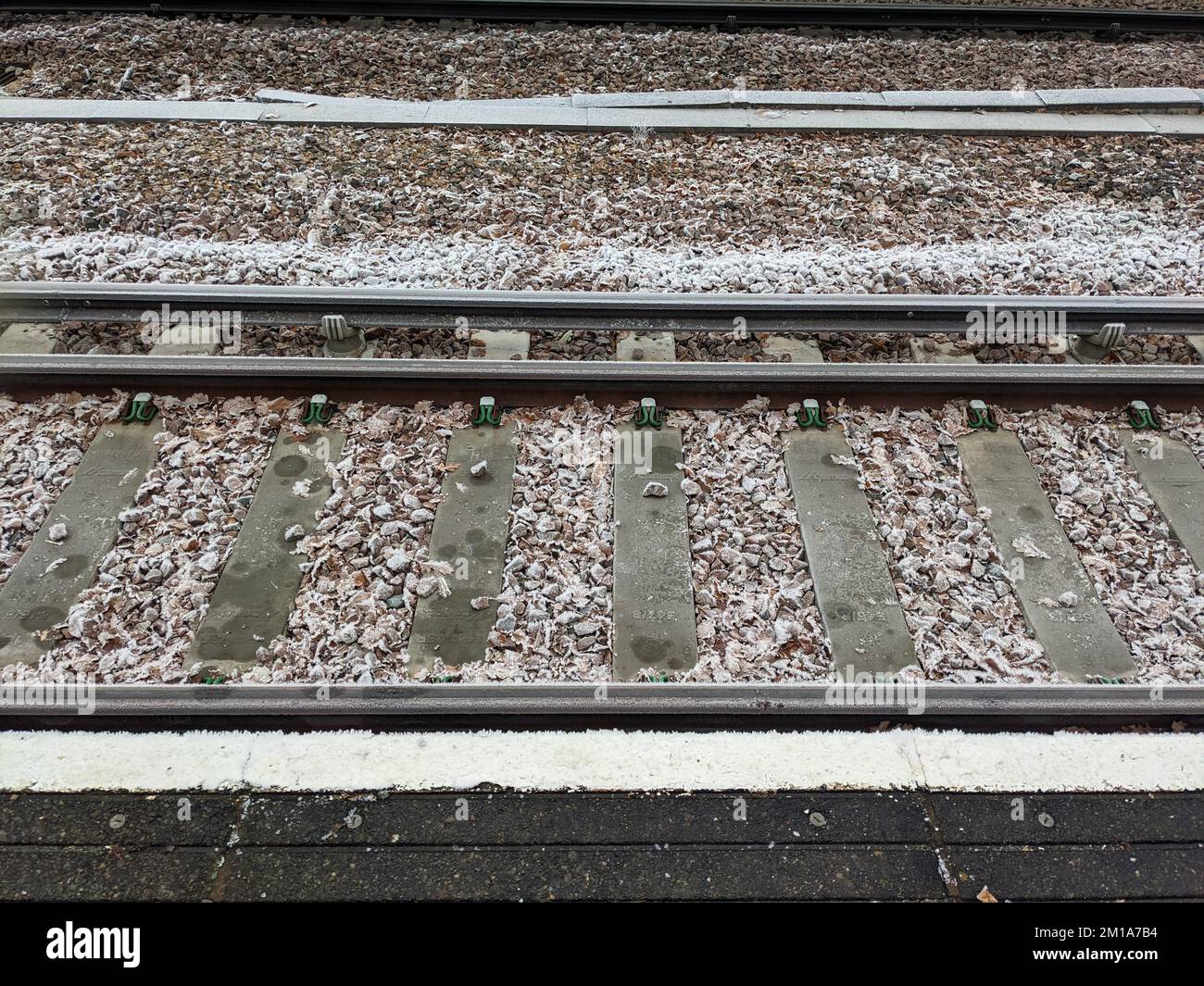 A A Railway Train Station Line Tracks on a Frosty Morning Transport ...