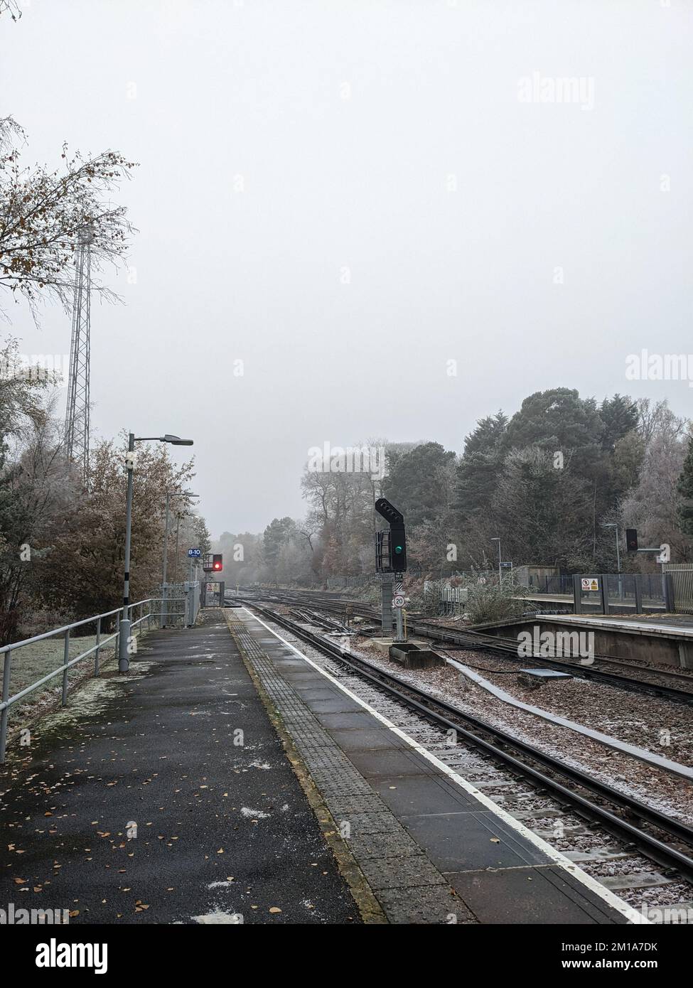A A Railway Train Station Line Tracks on a Frosty Morning Transport ...
