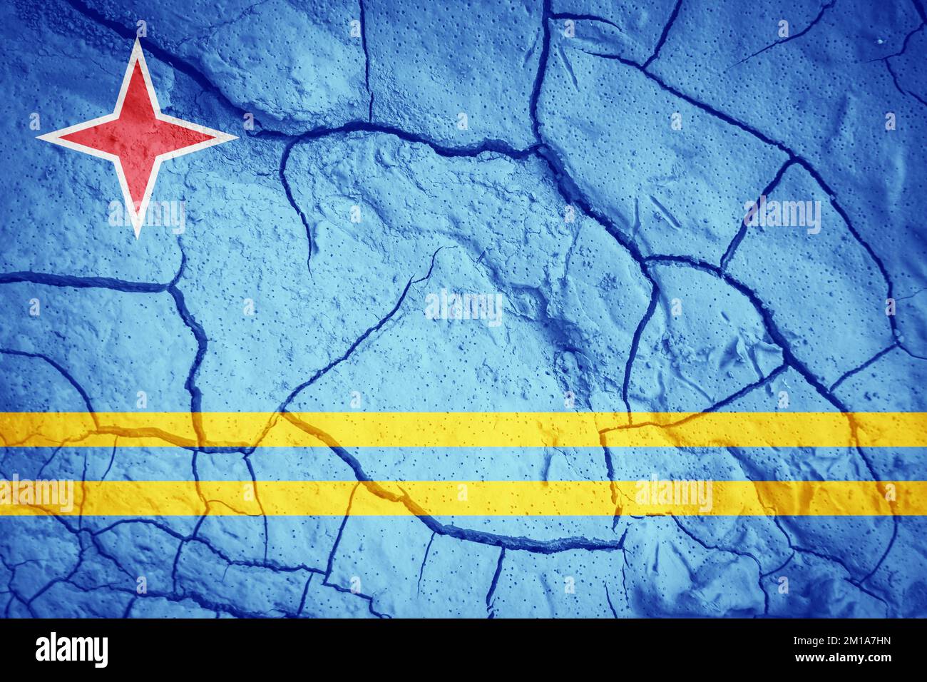 Flag of Aruba. Aruba symbol. Flag on the background of dry cracked ...