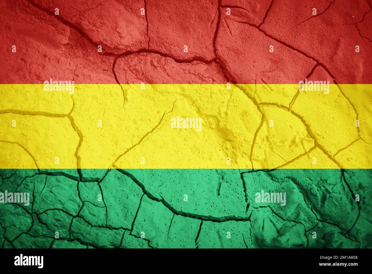 Flag of Bolivia. Bolivian symbol. Flag on the background of dry cracked ...