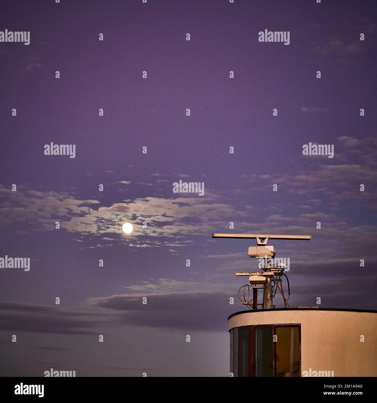 Nautical College radar station at Fleetwood at night under full moon ...