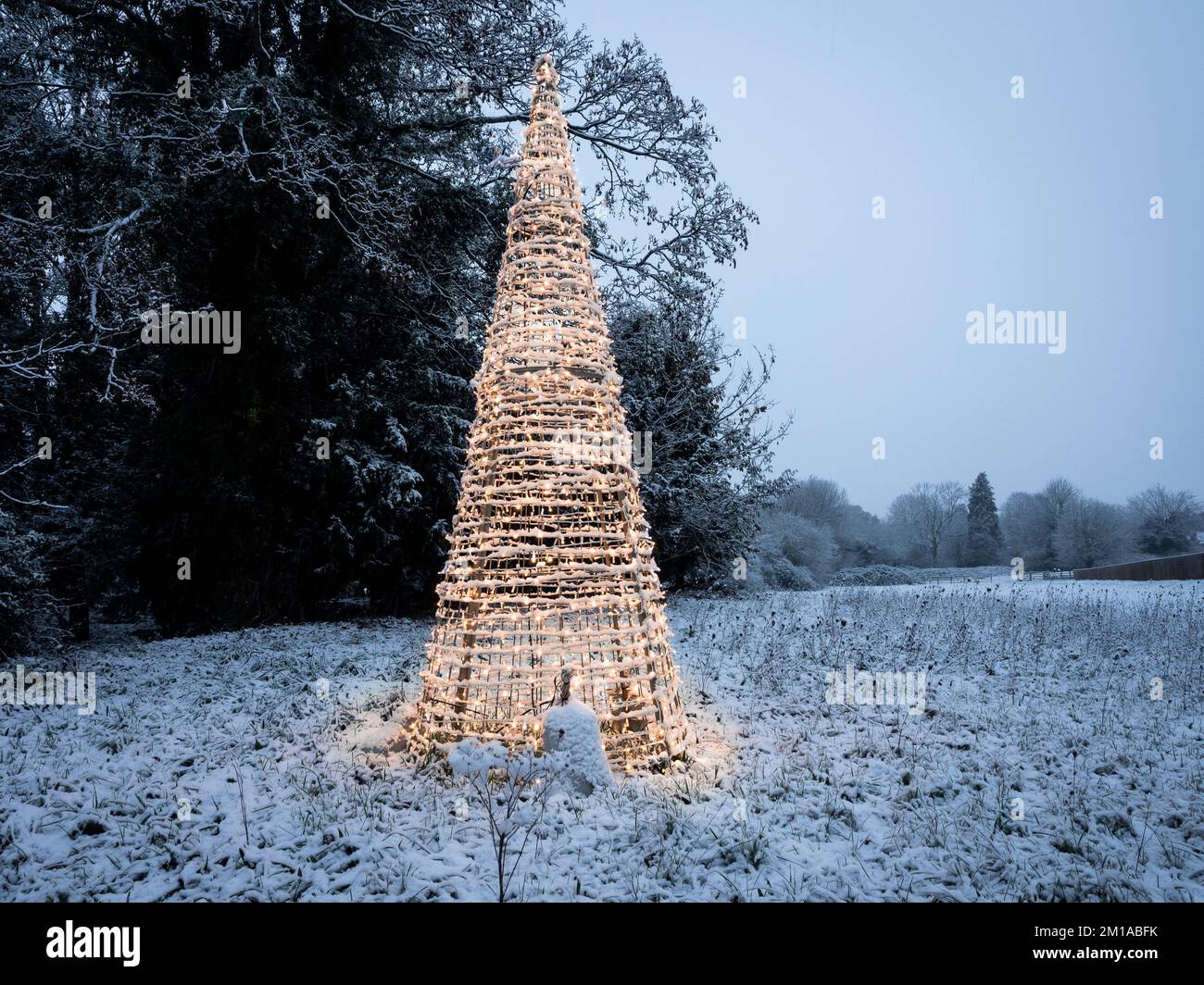 A Christmas tree shaped lighted decoration in a field. Wellesbourne ...